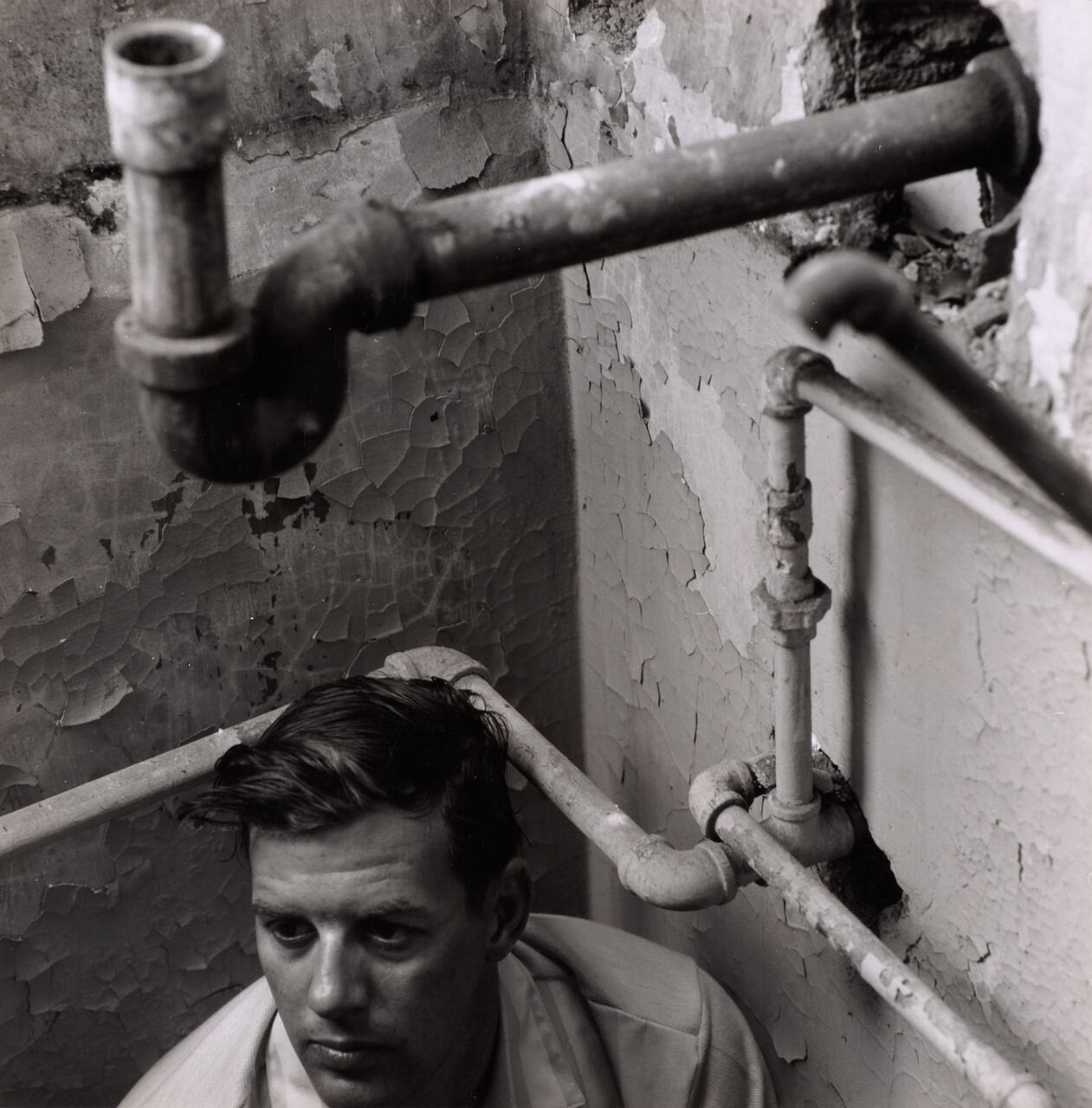 [Man in corner with pipes] – Works – The Nelson-Atkins Museum of Art